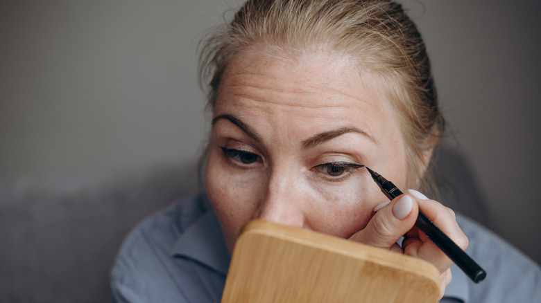 Why You'll Want To Keep Eyeliner In Your Makeup Bag If You're Over 40